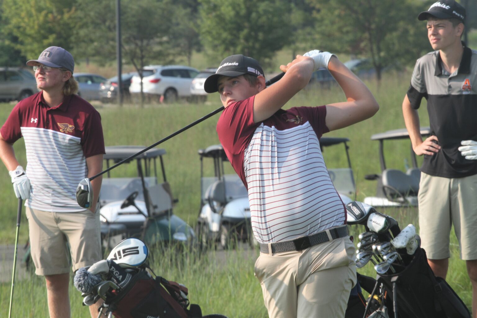 ‘The kids were less nervous’: Hawk golfers top Ames behind Hensen, Legg