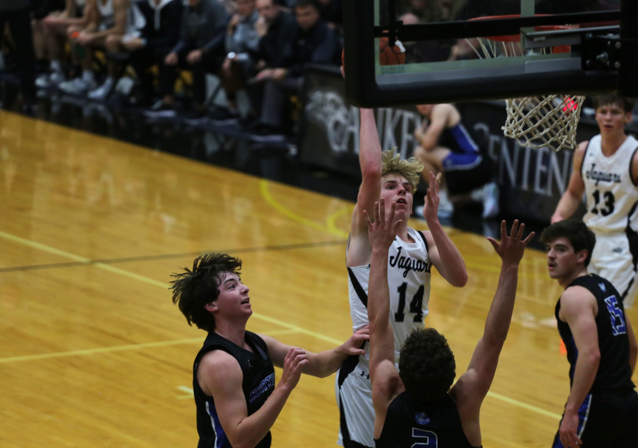 No. 1 Wolves win showdown against Centennial boys behind Sandfort’s 28