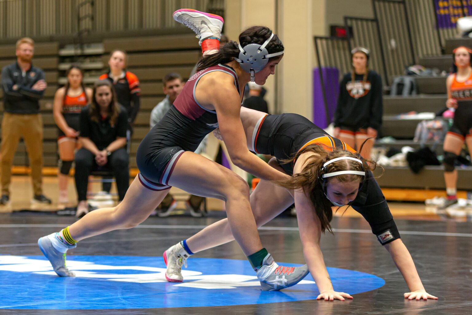 Ankeny girls rack up 7 falls, roll past Valley in CIML Conference opener
