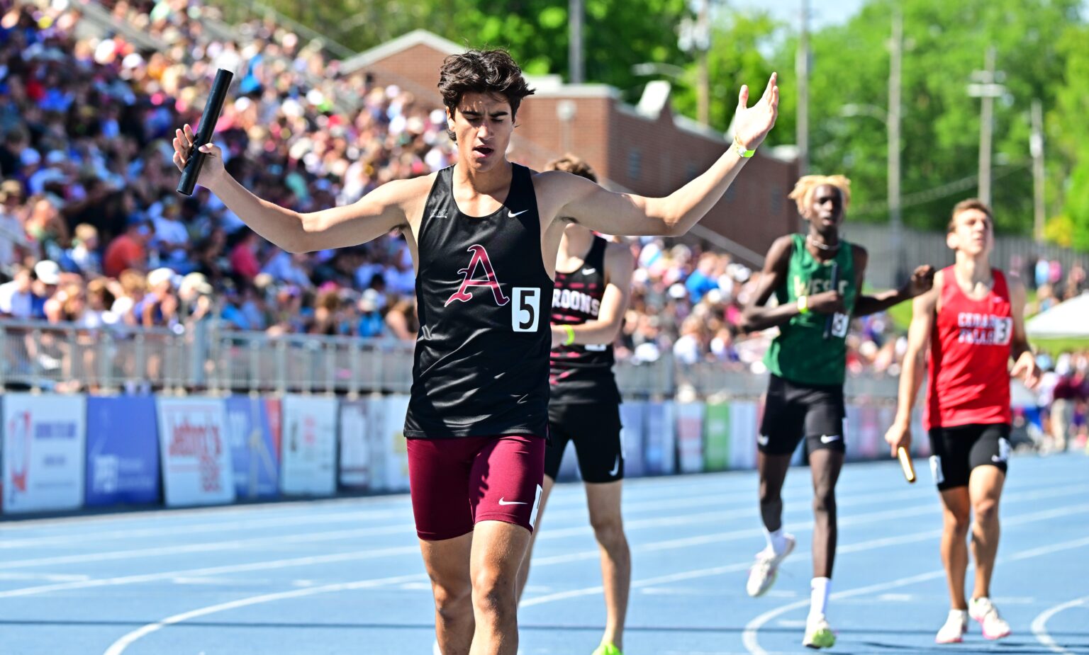 Hawks capture DMR crown, remain atop 4A standings; Jaguars claim 4×200 ...