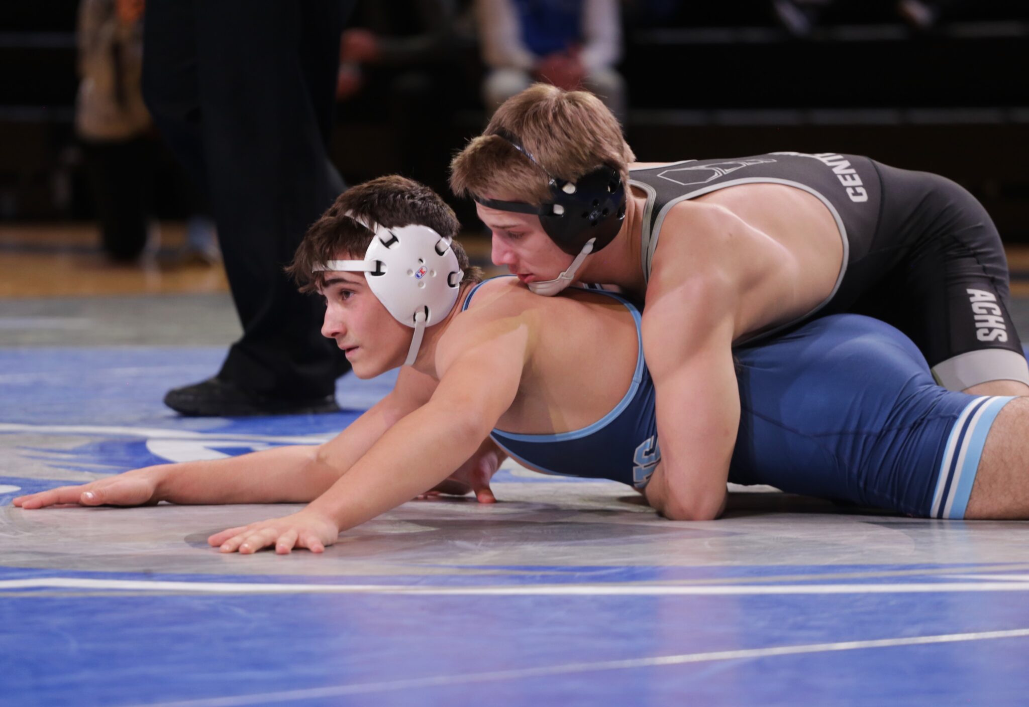 Jaguars capture district crown, qualify 9 wrestlers for Class 3A state ...