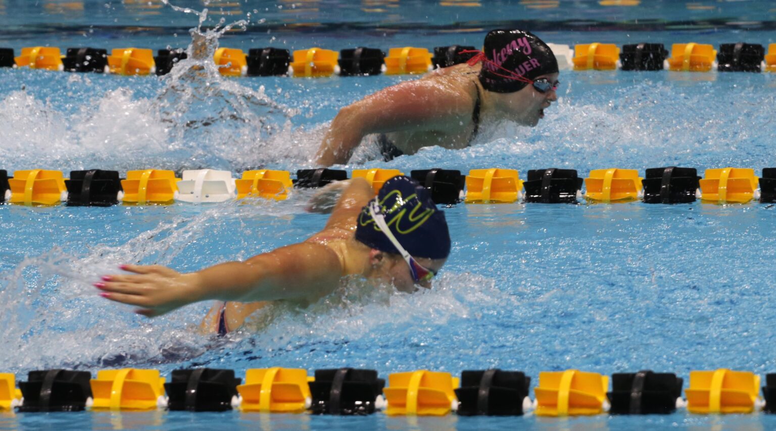 ‘I love to race’: Ankeny’s Villhauer sets PR in 100 butterfly during ...